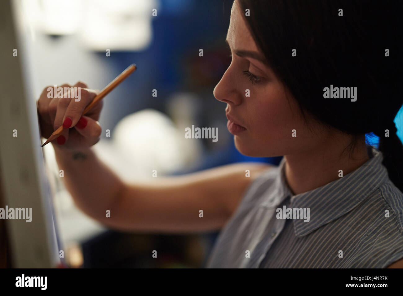 Talented woman drawing picture in hi-res stock photography and images ...