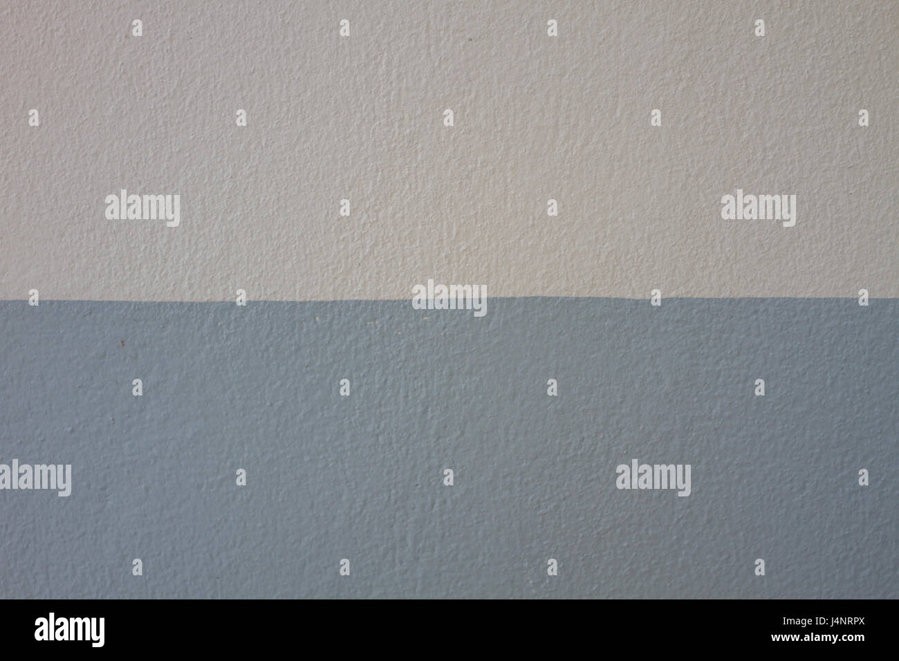 closeup walls are painted in two colors background Stock Photo - Alamy