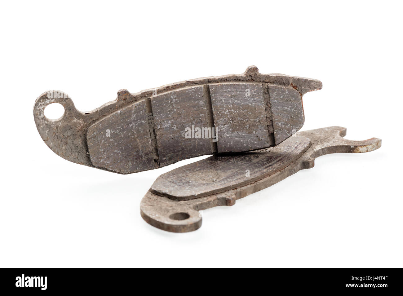 worn motorcycle disc break pads on white background Stock Photo - Alamy
