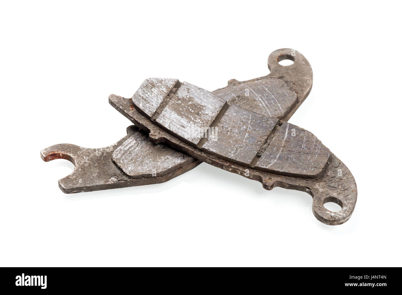 worn motorcycle disc break pads on white background Stock Photo - Alamy