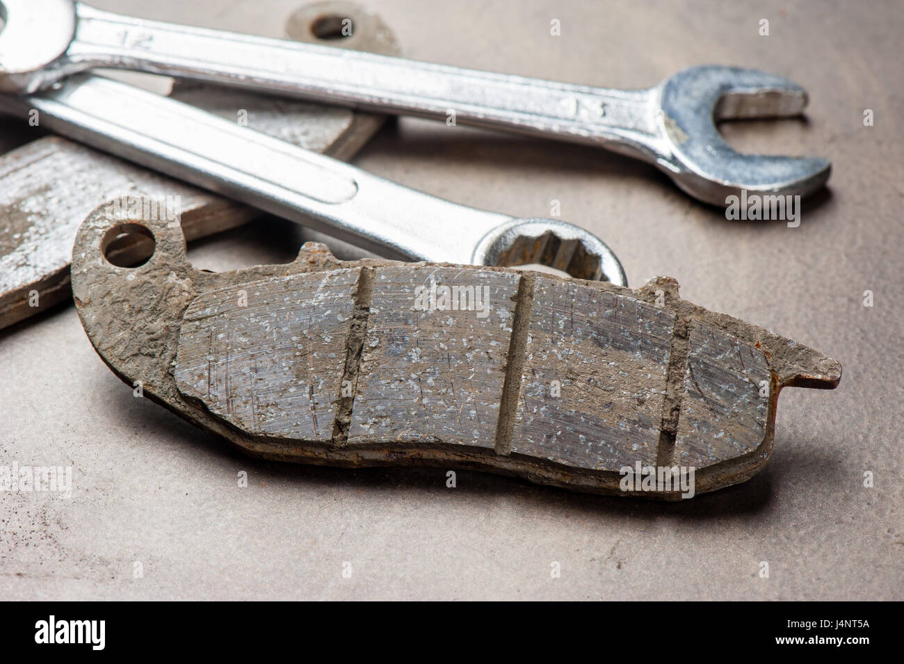 worn motorcycle disc break pads Stock Photo - Alamy