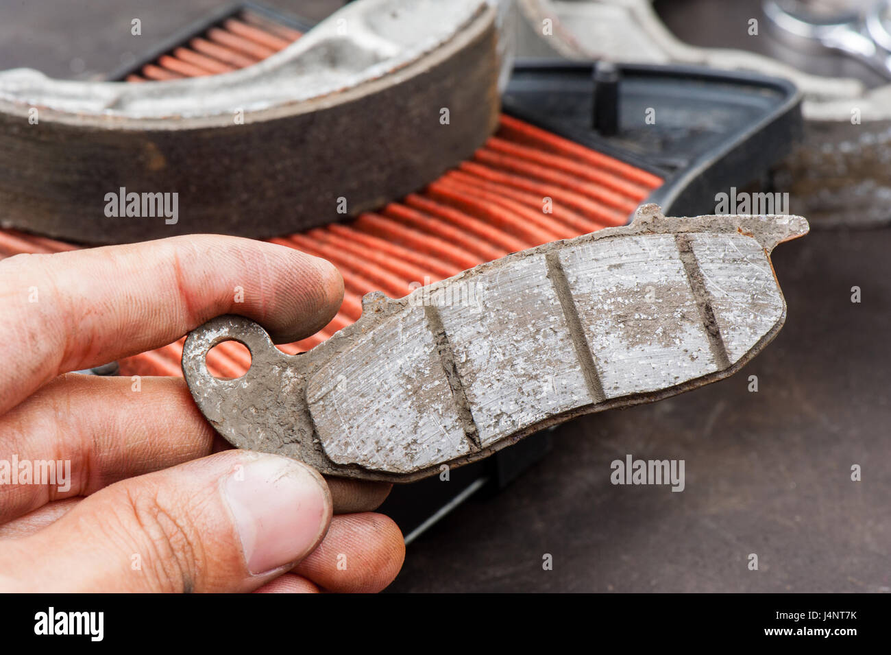 worn motorcycle disc break pads Stock Photo - Alamy