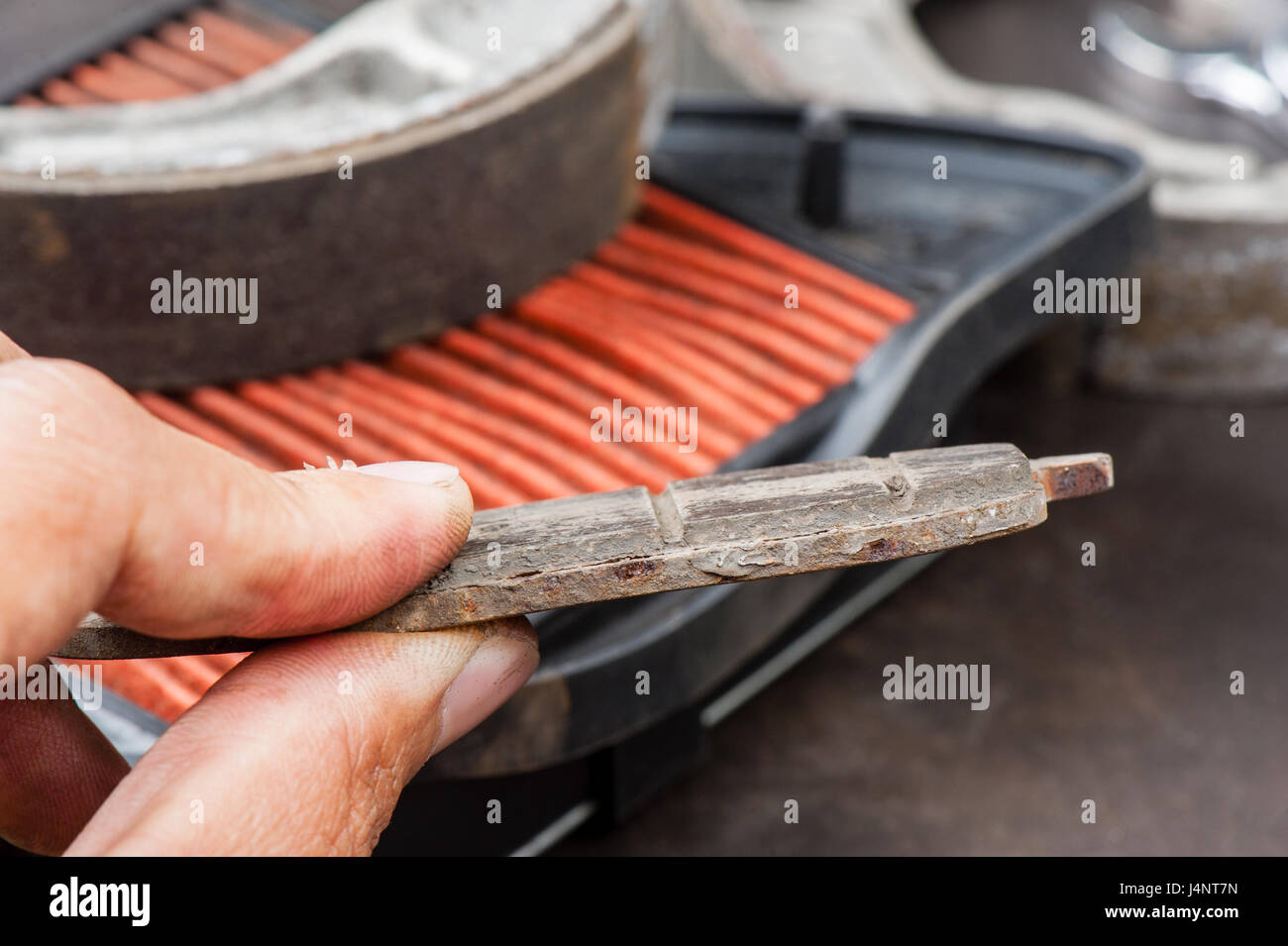 worn motorcycle disc break pads Stock Photo - Alamy