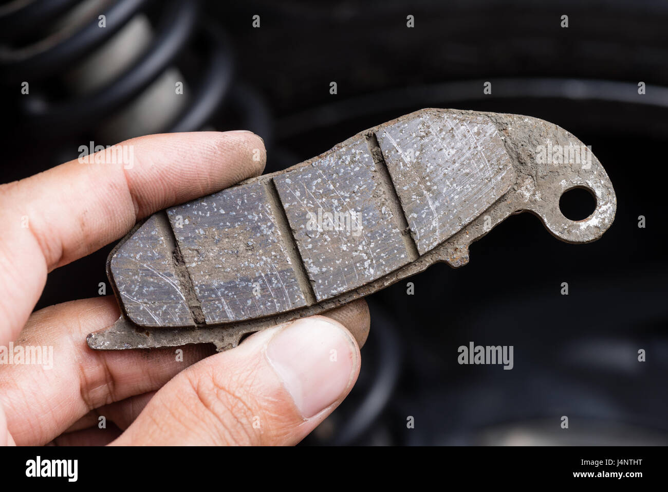 worn motorcycle disc break pads Stock Photo - Alamy