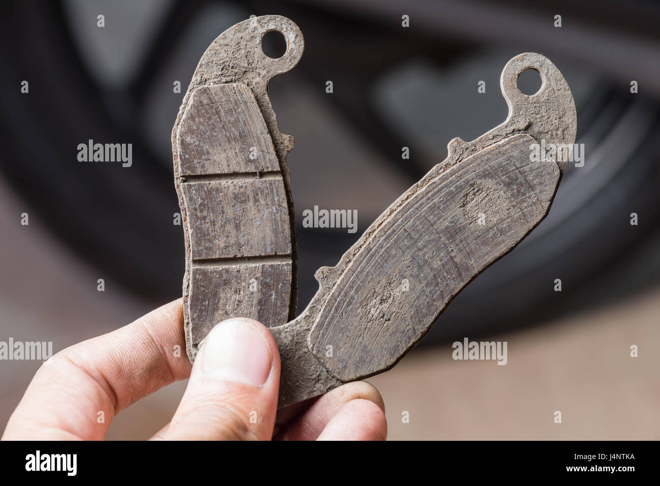 worn motorcycle disc break pads Stock Photo - Alamy