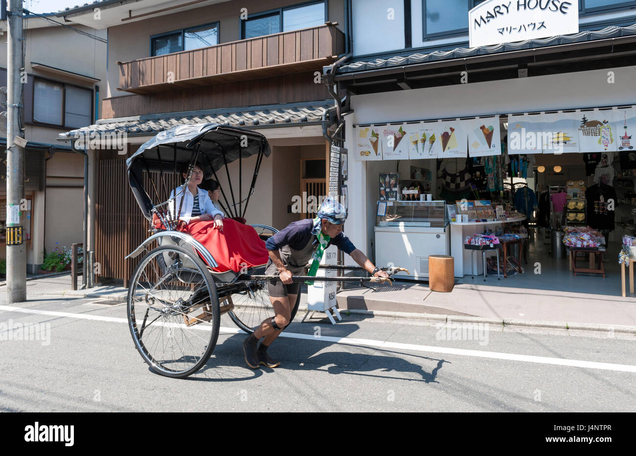 Kyoto, Japan - March 2016: Japanese traditional hand pulled rickshaw ...