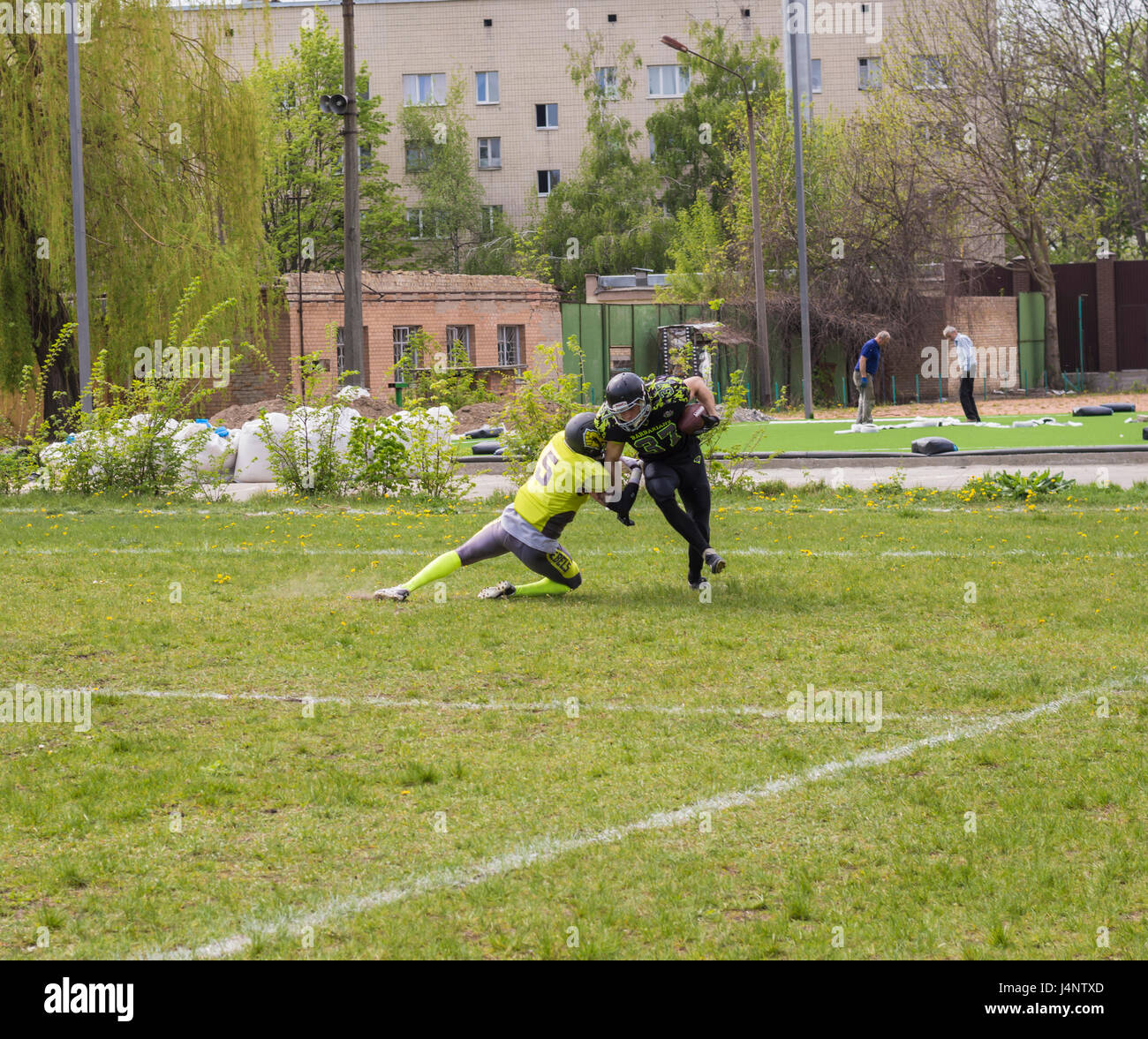 Football tackle hi-res stock photography and images - Alamy