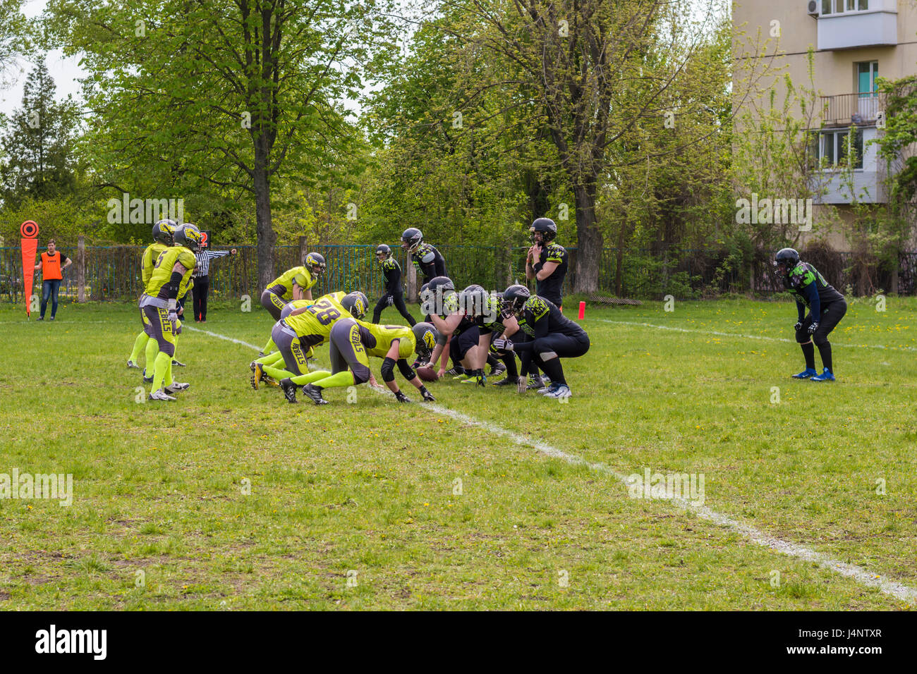 Football Teams Prepared to Snap Stock Photo - Alamy
