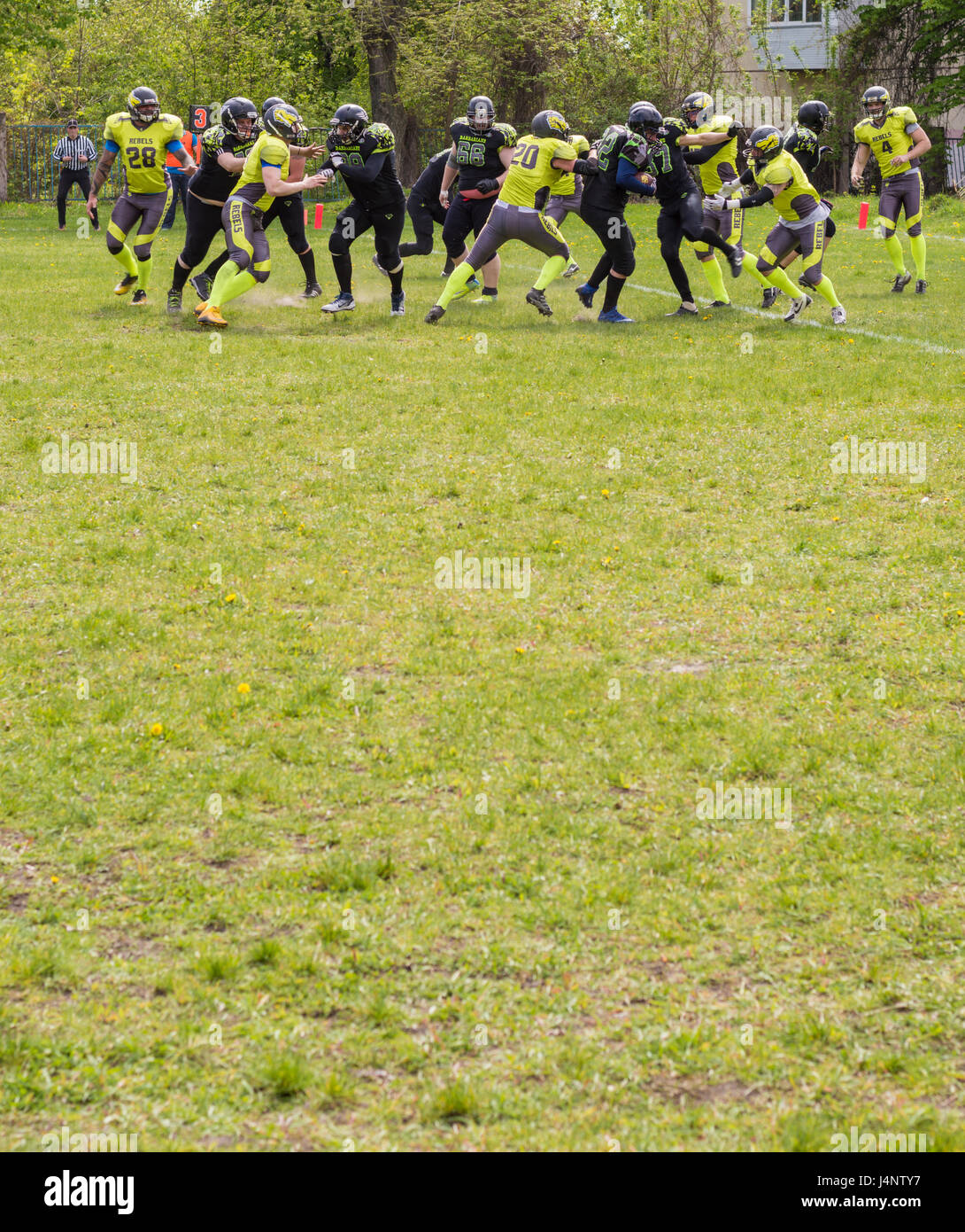 American Football Players in Action During Match Stock Photo - Alamy