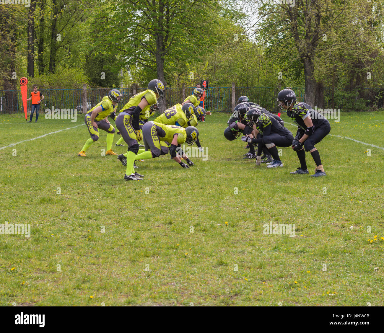 Football Teams Prepared to Snap Stock Photo - Alamy