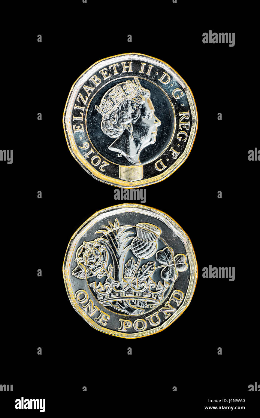 New British £1 coin on black background Stock Photo - Alamy