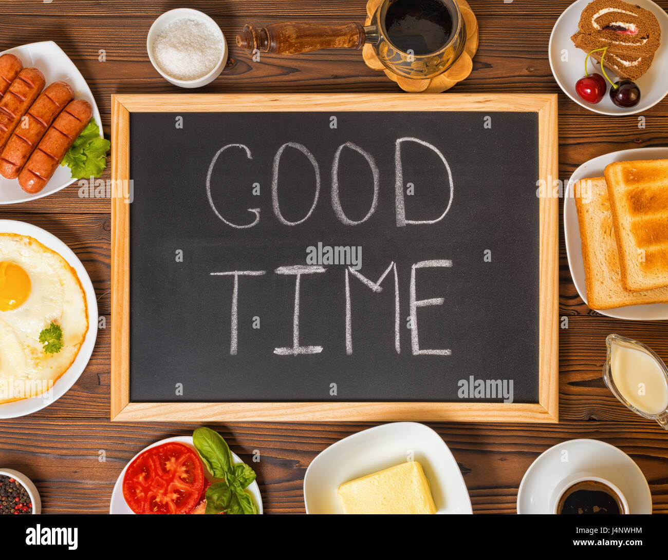 concept of morning breakfast with setting food products over wooden ...