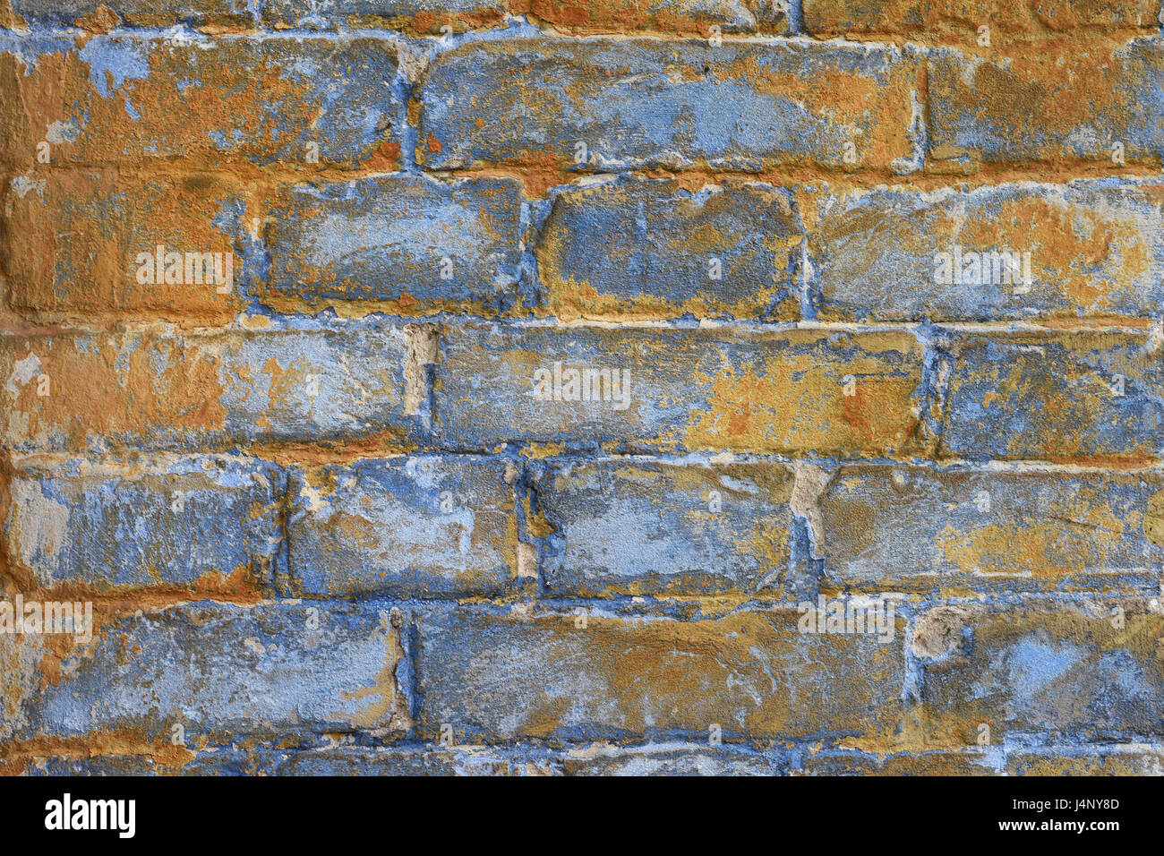 Fragment of old brickwork: bricks blue tint with rusty rust color ...
