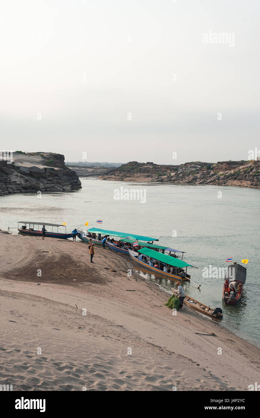 Longtail boat, Berth at sand Sam Pan Bok Grand Canyon in Maekhong river ...