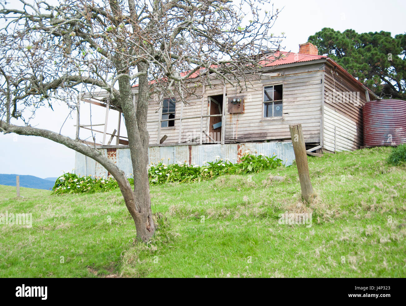 This abandoned farm house is falling apart due to the weather and ...
