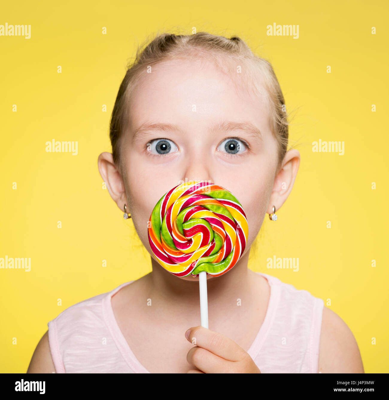 girl with bright icicle on a stick Stock Photo - Alamy