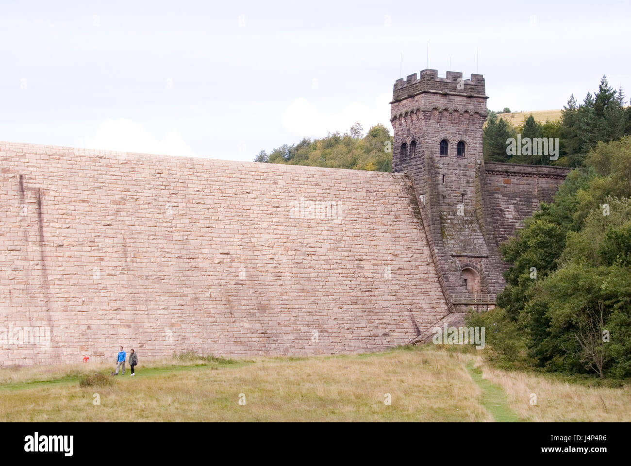 DERBYSHIRE UK - 24 Aug: The imposing wall of Derwent Dam and turrets on ...
