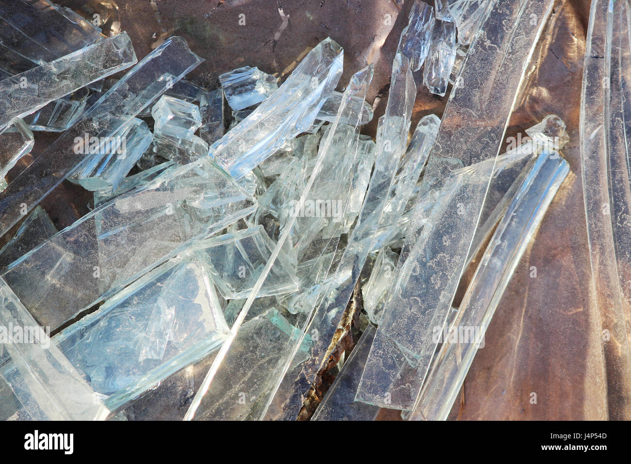 Vandals smashed the glass windows of the unfinished unguarded abandoned ...