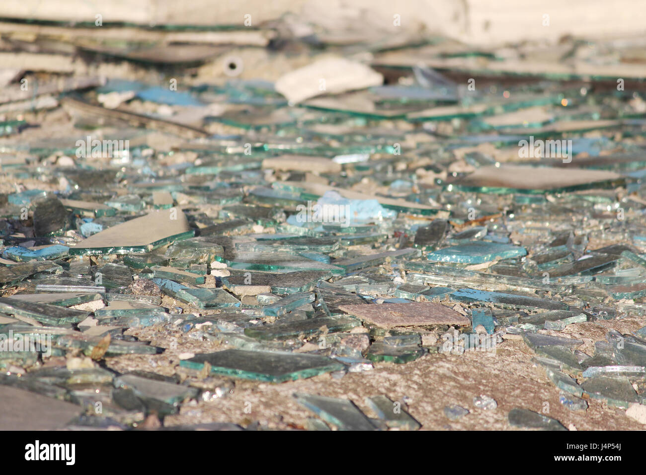 Vandals smashed the glass windows of the unfinished unguarded abandoned ...
