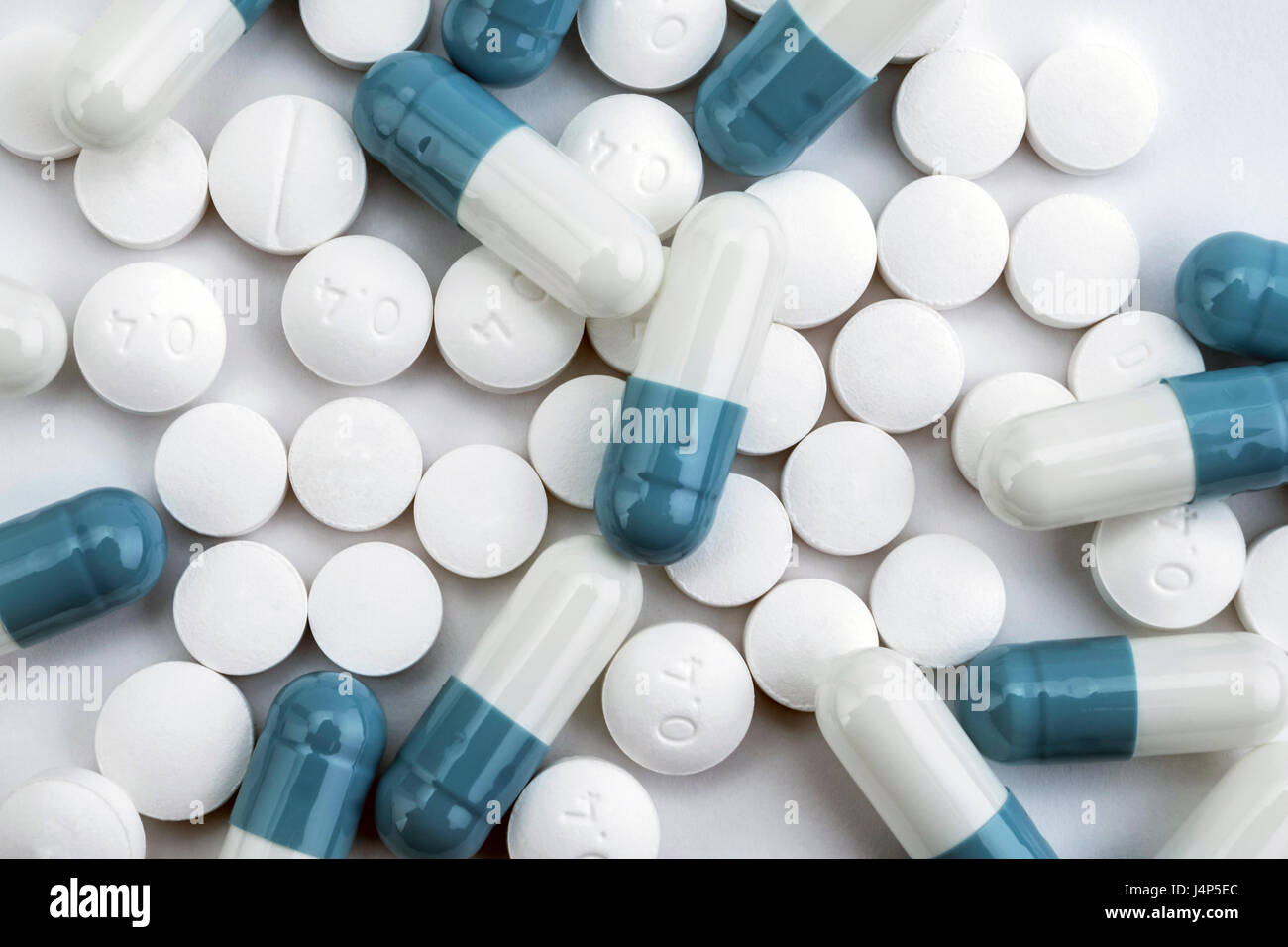 Many white capsules on hi-res stock photography and images - Alamy