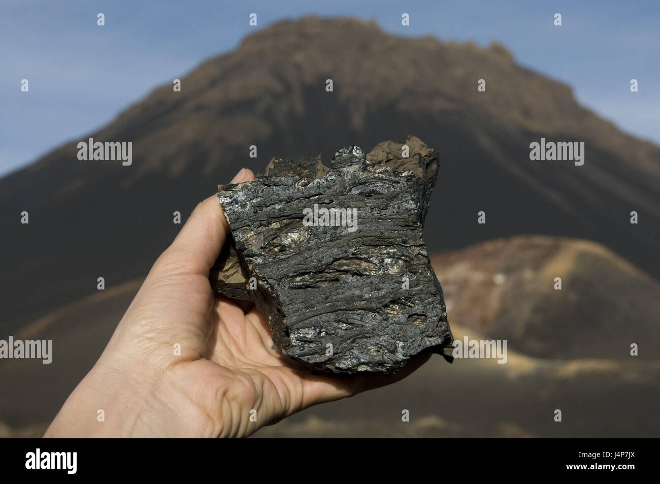 Hand, lava piece, hold, volcano Fogo, Kapverden Stock Photo - Alamy