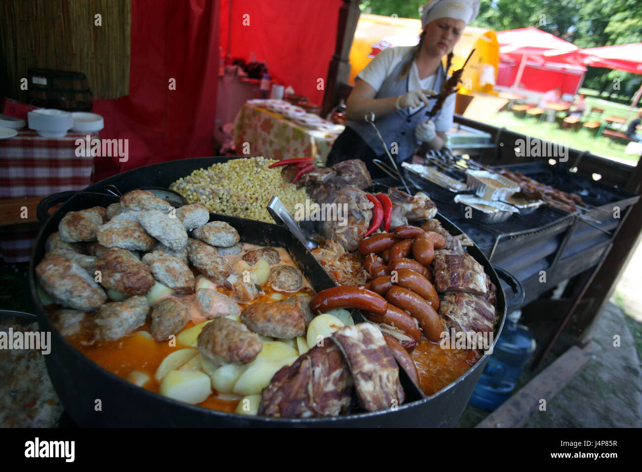 Lithuania, Vilnius, Old Town, folklore feast, sales booth, foods Stock ...