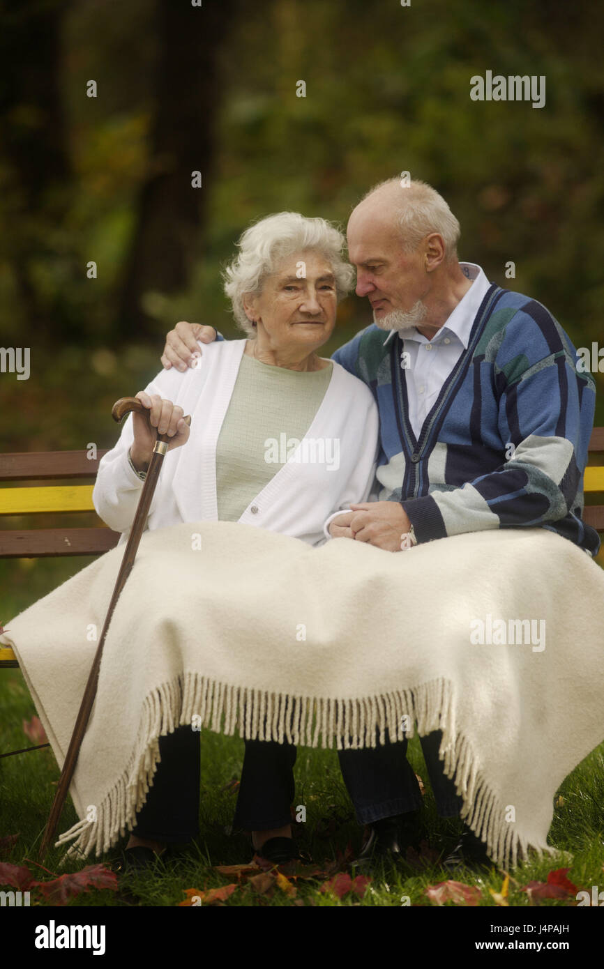 Senior citizen's couple, park-bench, sit, caps, model released Stock ...