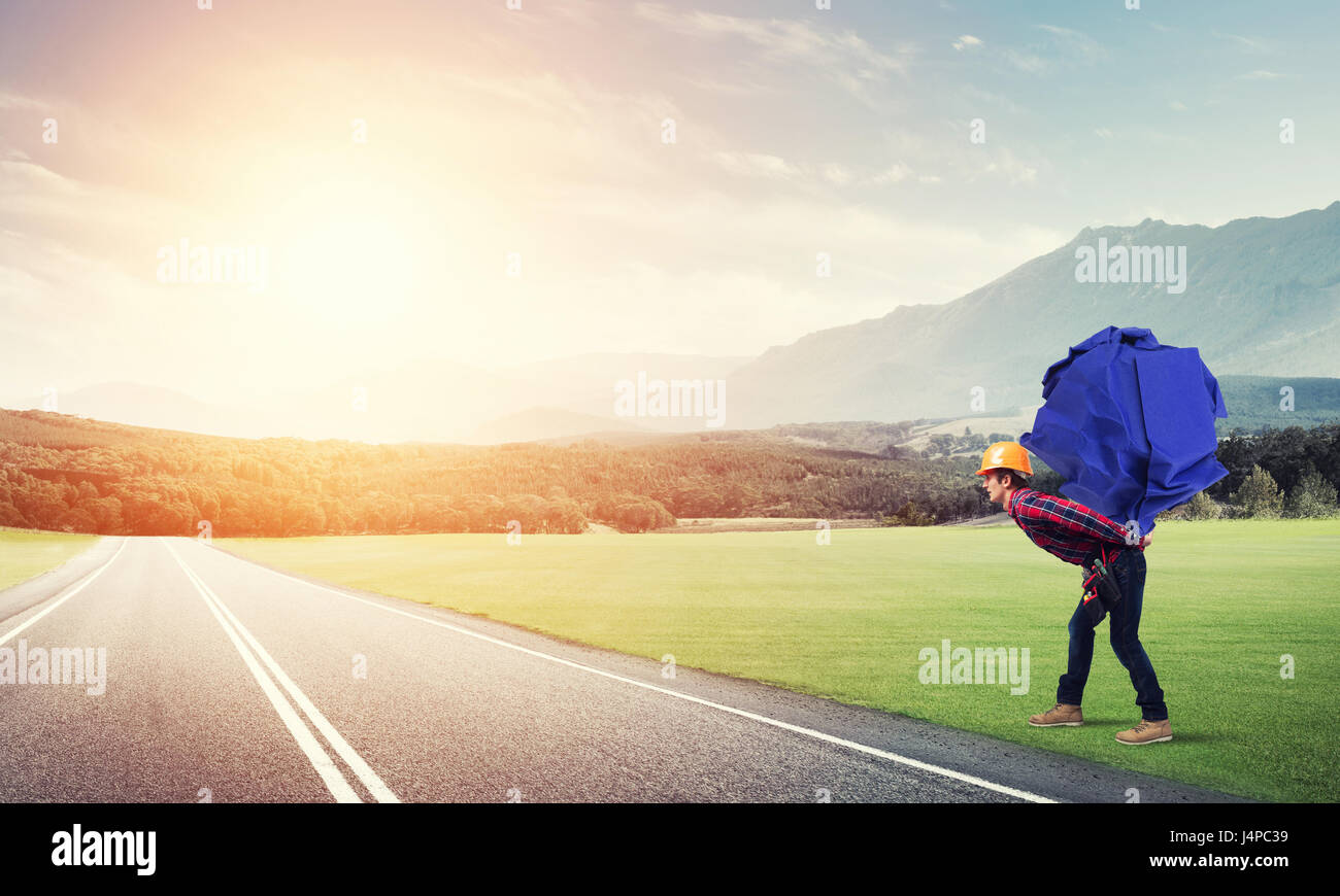 Engineer man carry load Stock Photo - Alamy
