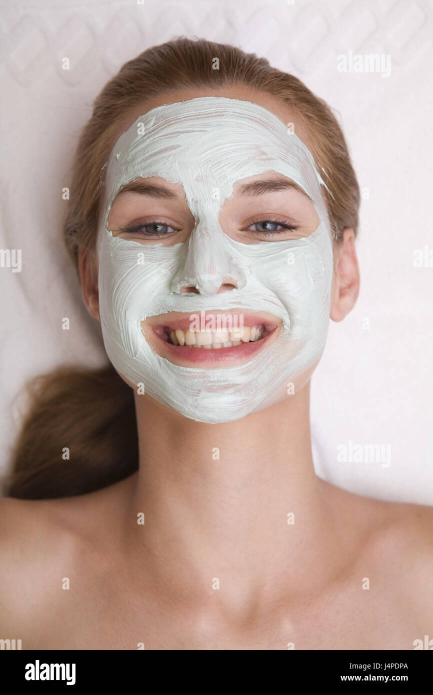 Young woman with a mask, lie, smile, portrait, model released Stock ...