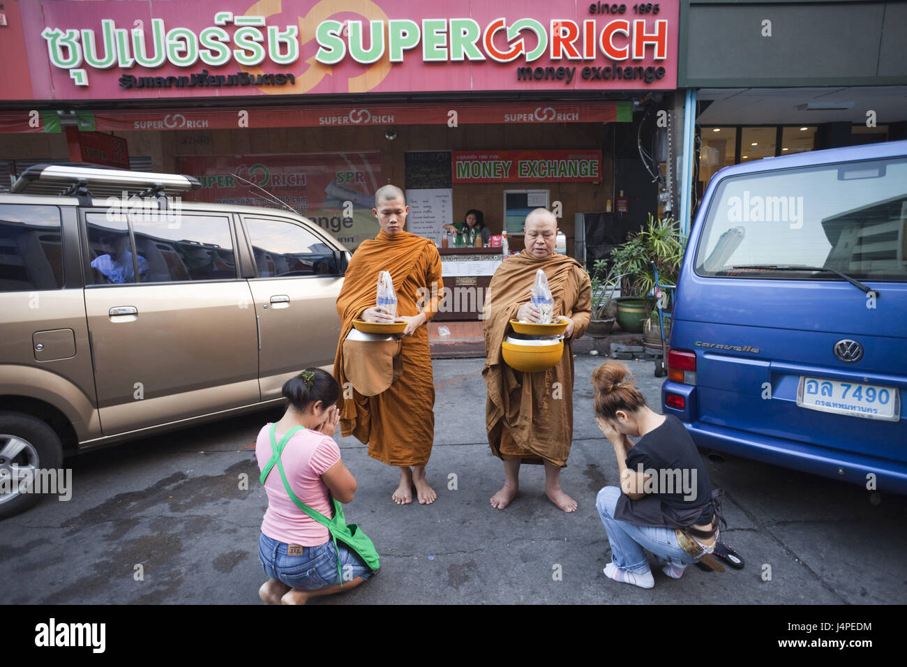 Thailand, Bangkok, roadside, monks, beg, women, kneel, pray Stock Photo ...