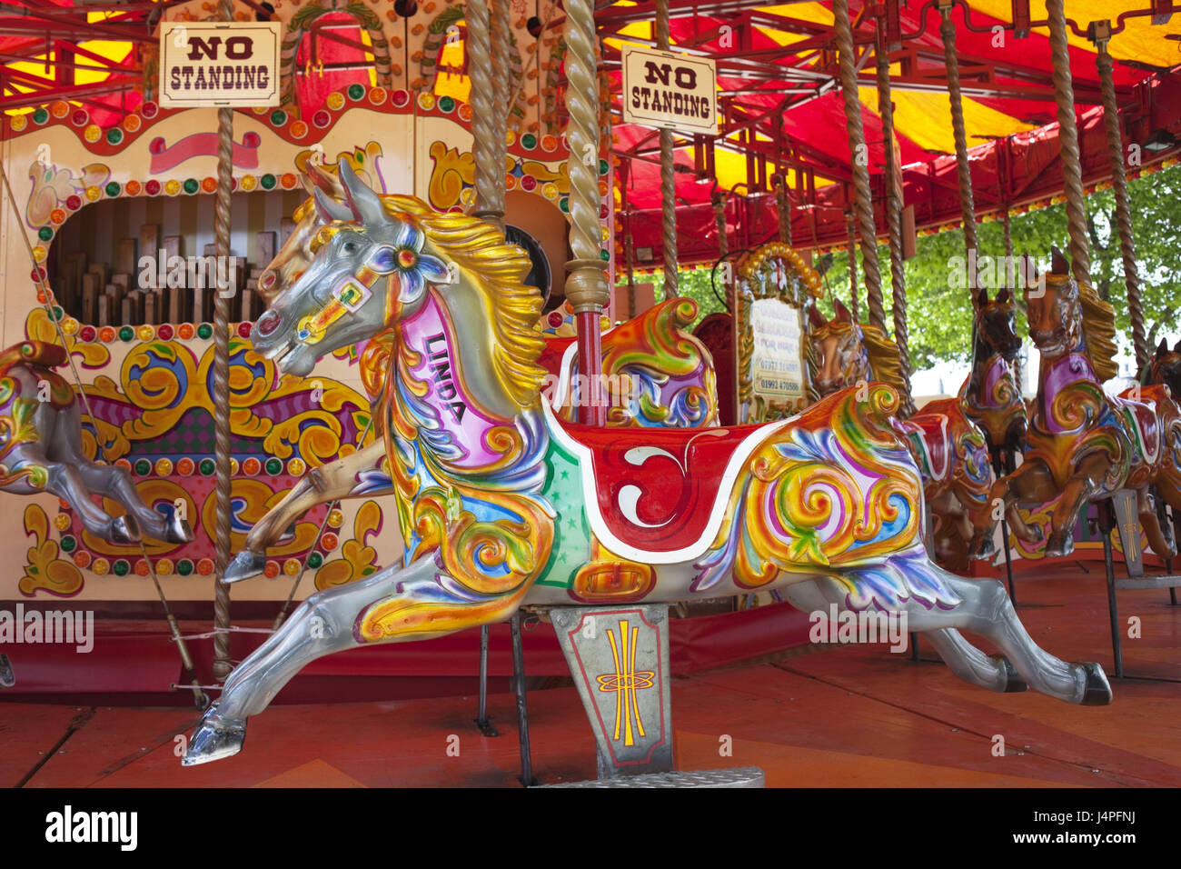 Great Britain, England, roundabout, horses Stock Photo - Alamy