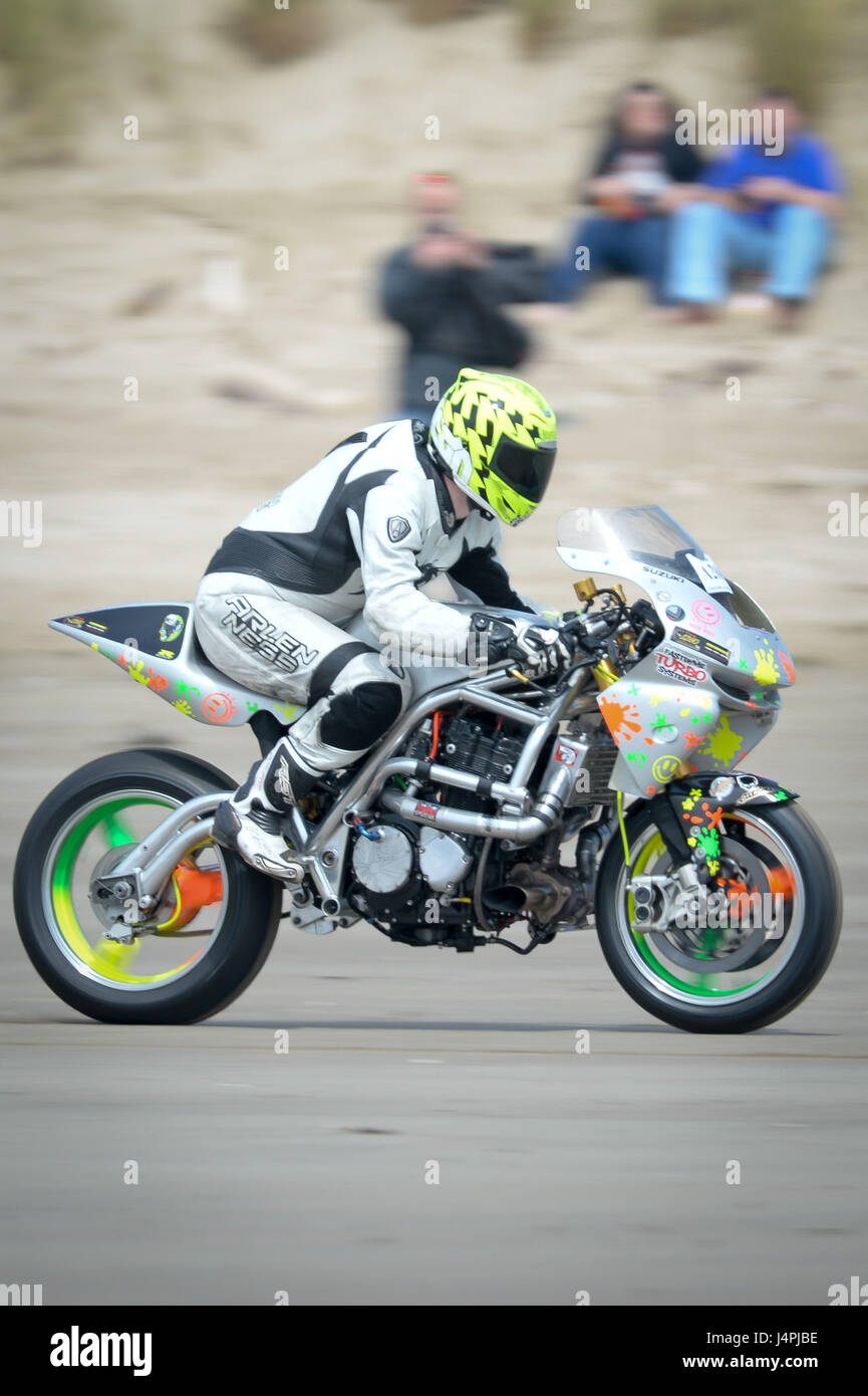 A motorcycle rider races in the Straightliners 'Top Speed' event at ...