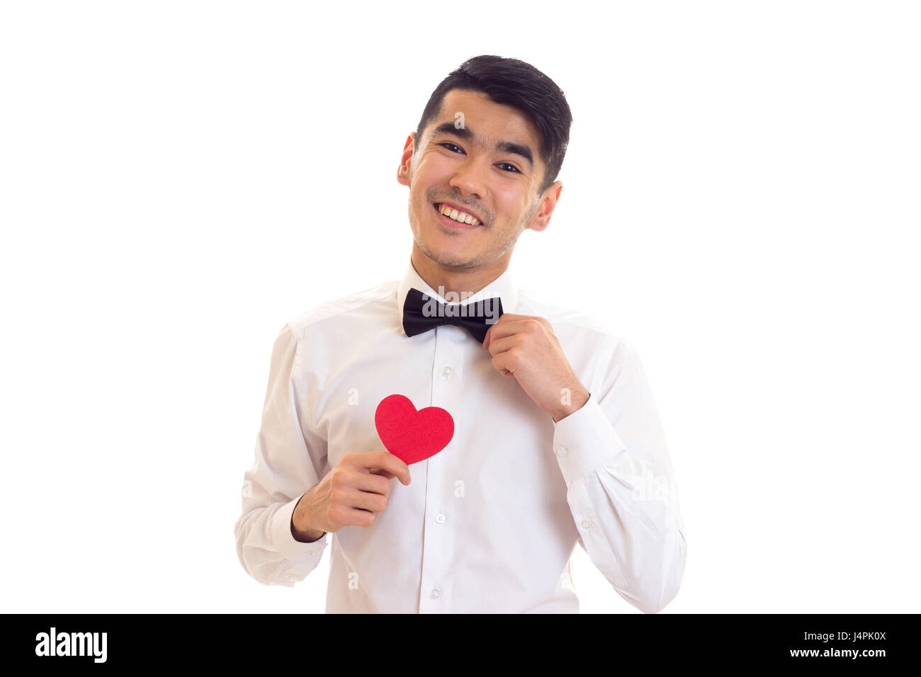 Young man holding a read heart Stock Photo - Alamy