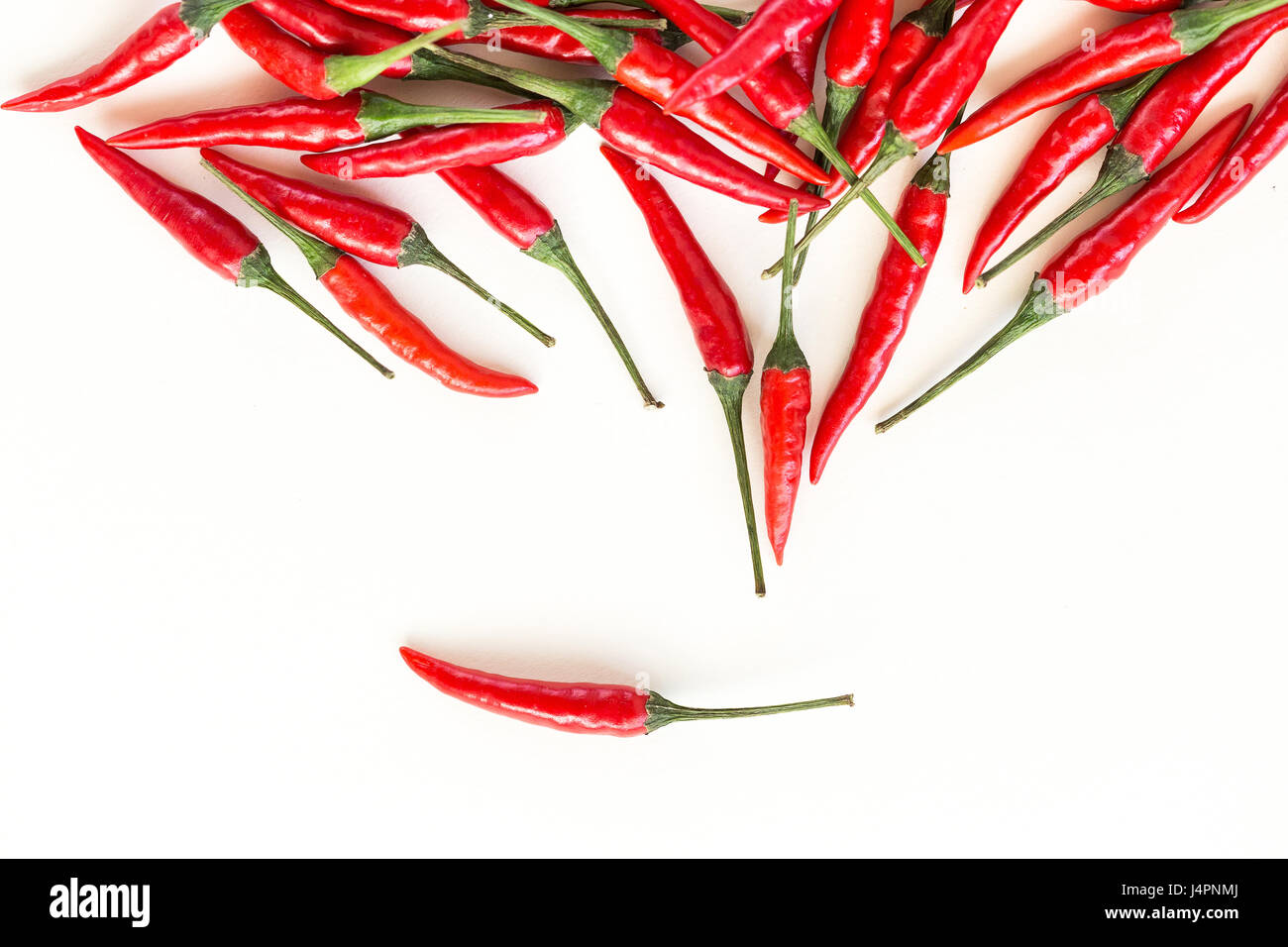 red hot chili peppers, popular spices concept - beautiful handful of ...