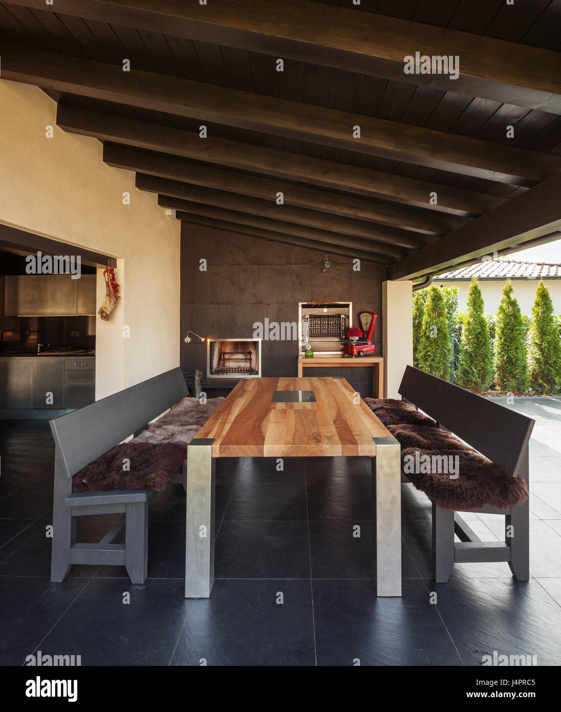 Veranda with table in exterior Stock Photo - Alamy