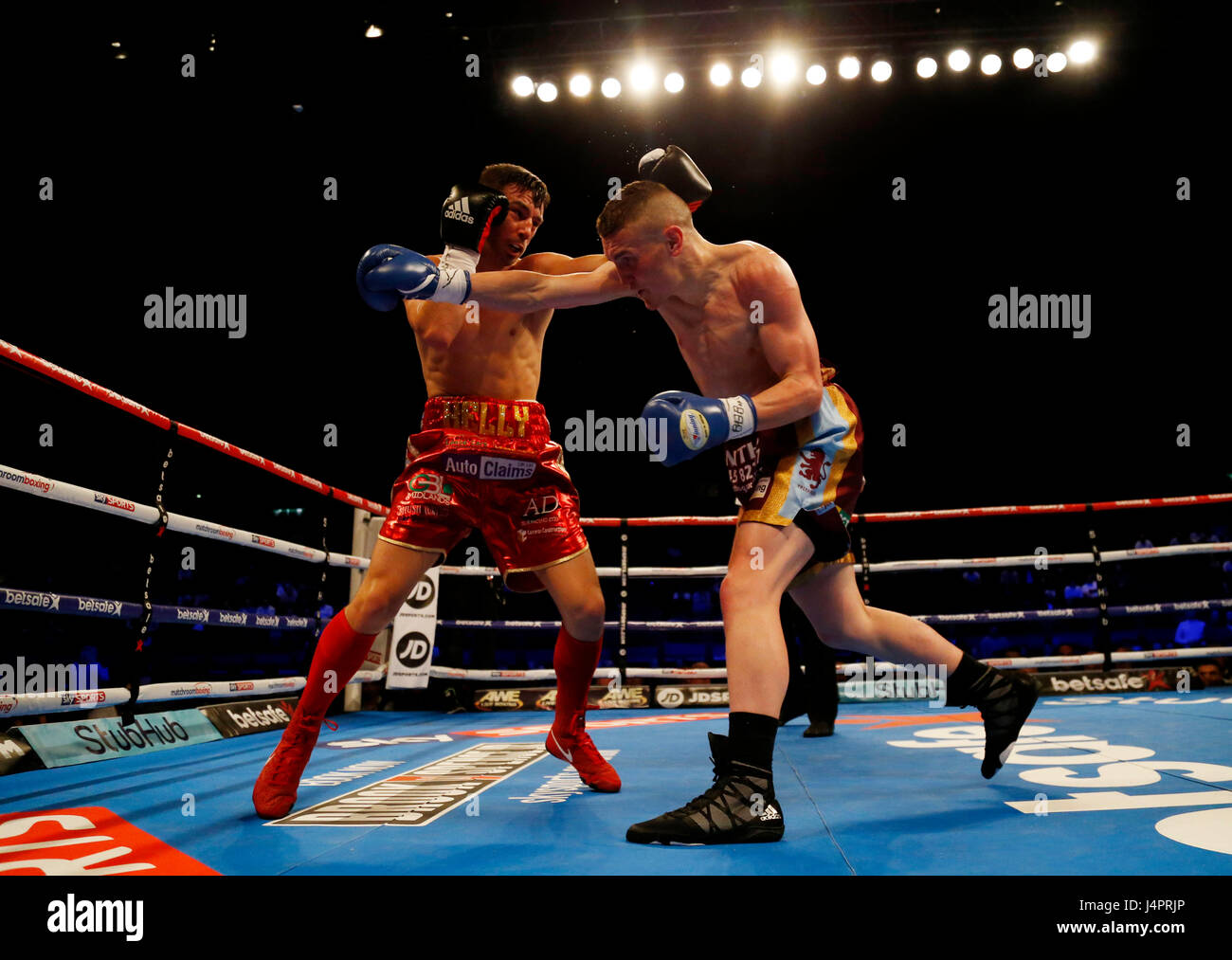 Adam Harper (left) in action against Ryan Kelly during their Midland ...