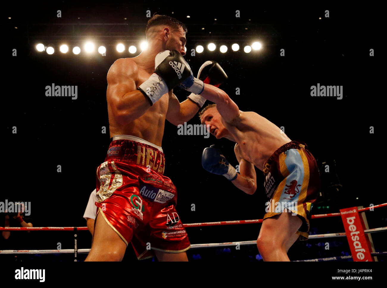 Adam Harper (left) in action against Ryan Kelly during their Midland ...