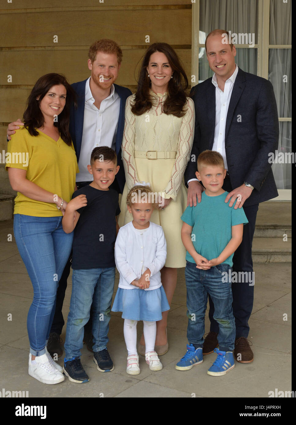 Prince Harry (2nd left) , The Duke and Duchess of Cambridge backstage ...