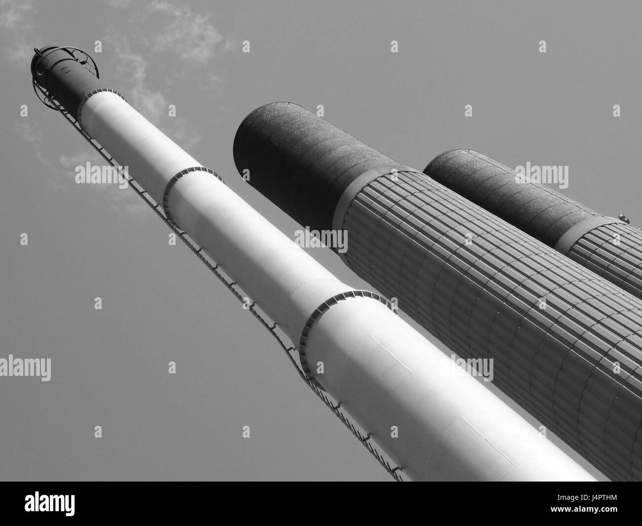 tall industrial chimneys in steel and concrete Stock Photo - Alamy