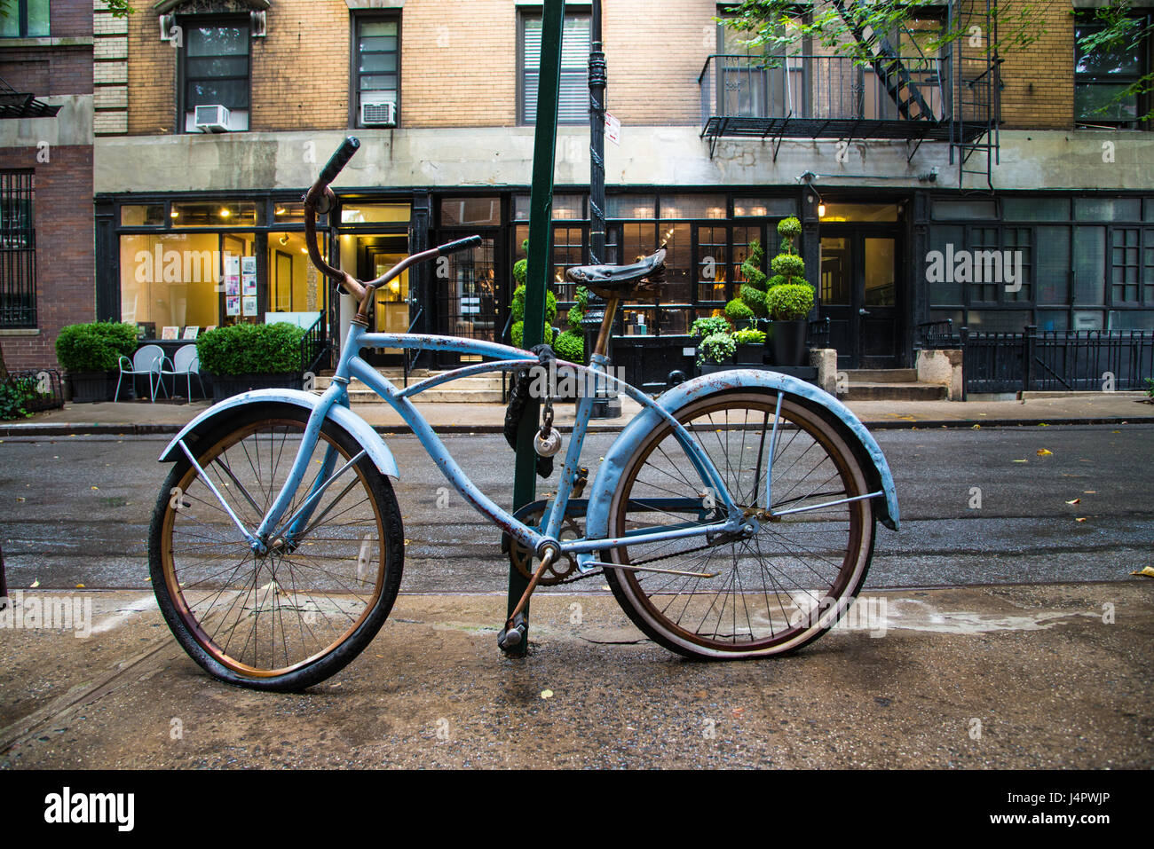 All bicycle lock on the sidewalk in New York City Stock Photo - Alamy