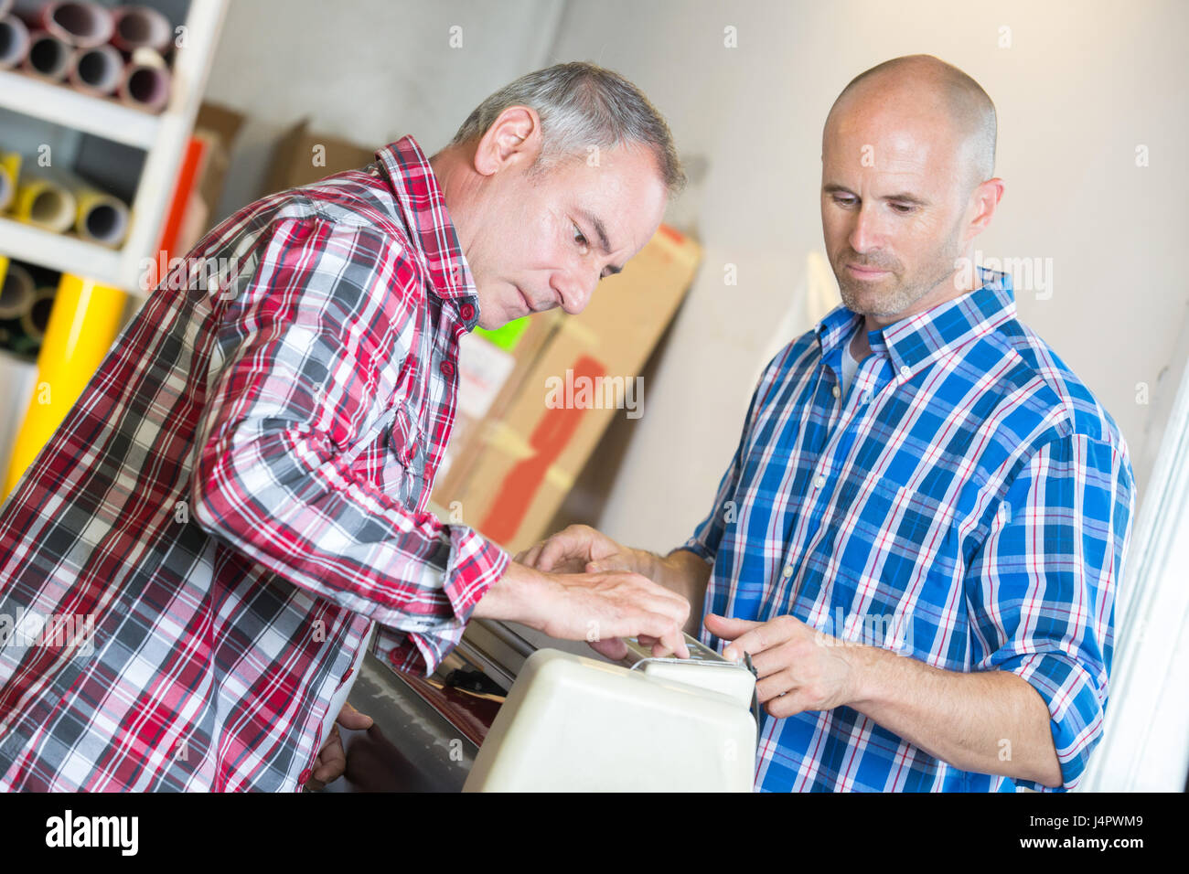 a second hand machine Stock Photo - Alamy