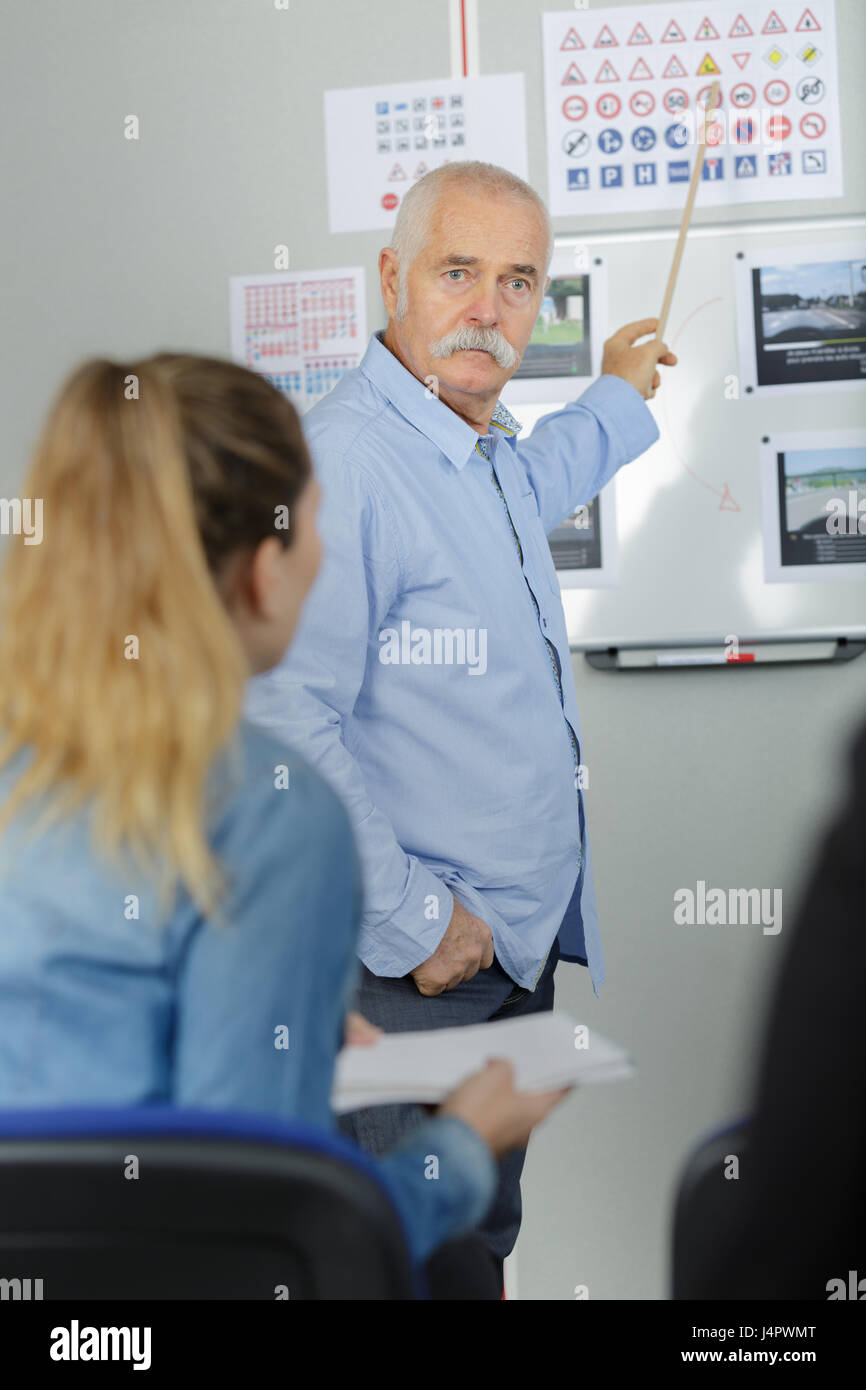 Man teaching driving theory Stock Photo - Alamy