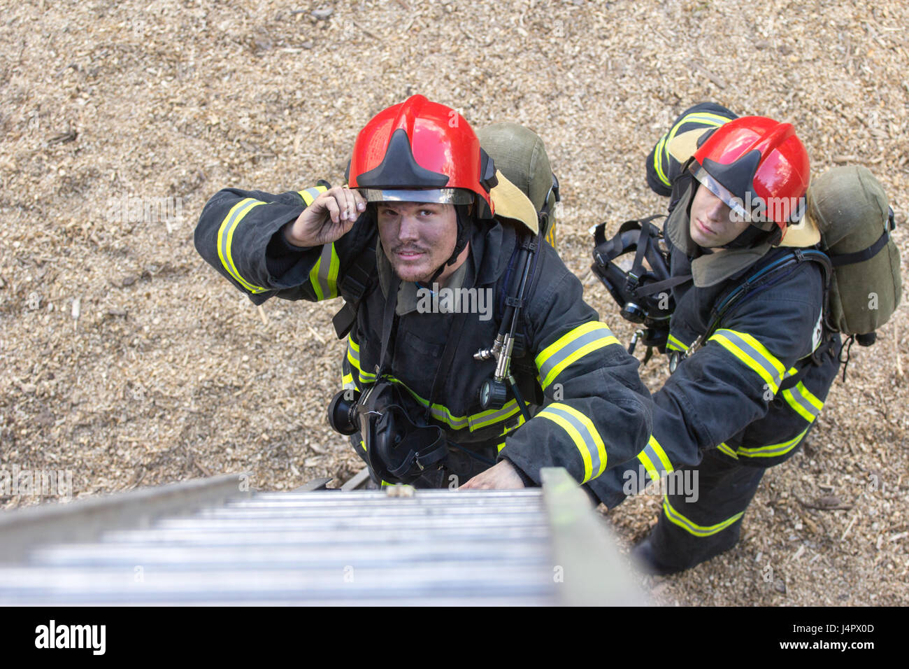 Portrait of a fireman top view from stage Stock Photo - Alamy