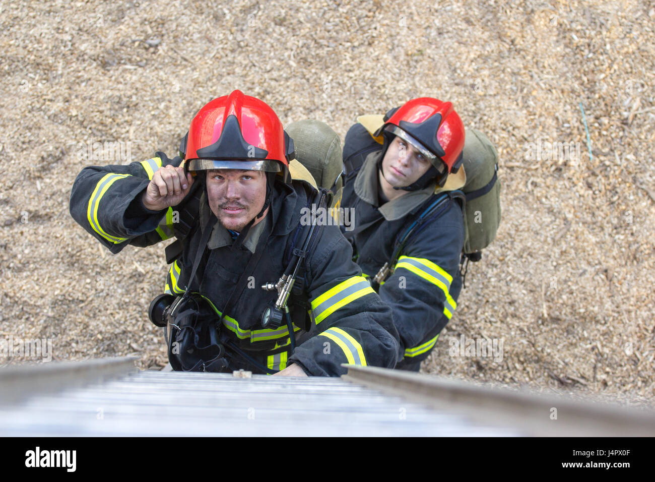 Portrait of a fireman top view from stage Stock Photo - Alamy