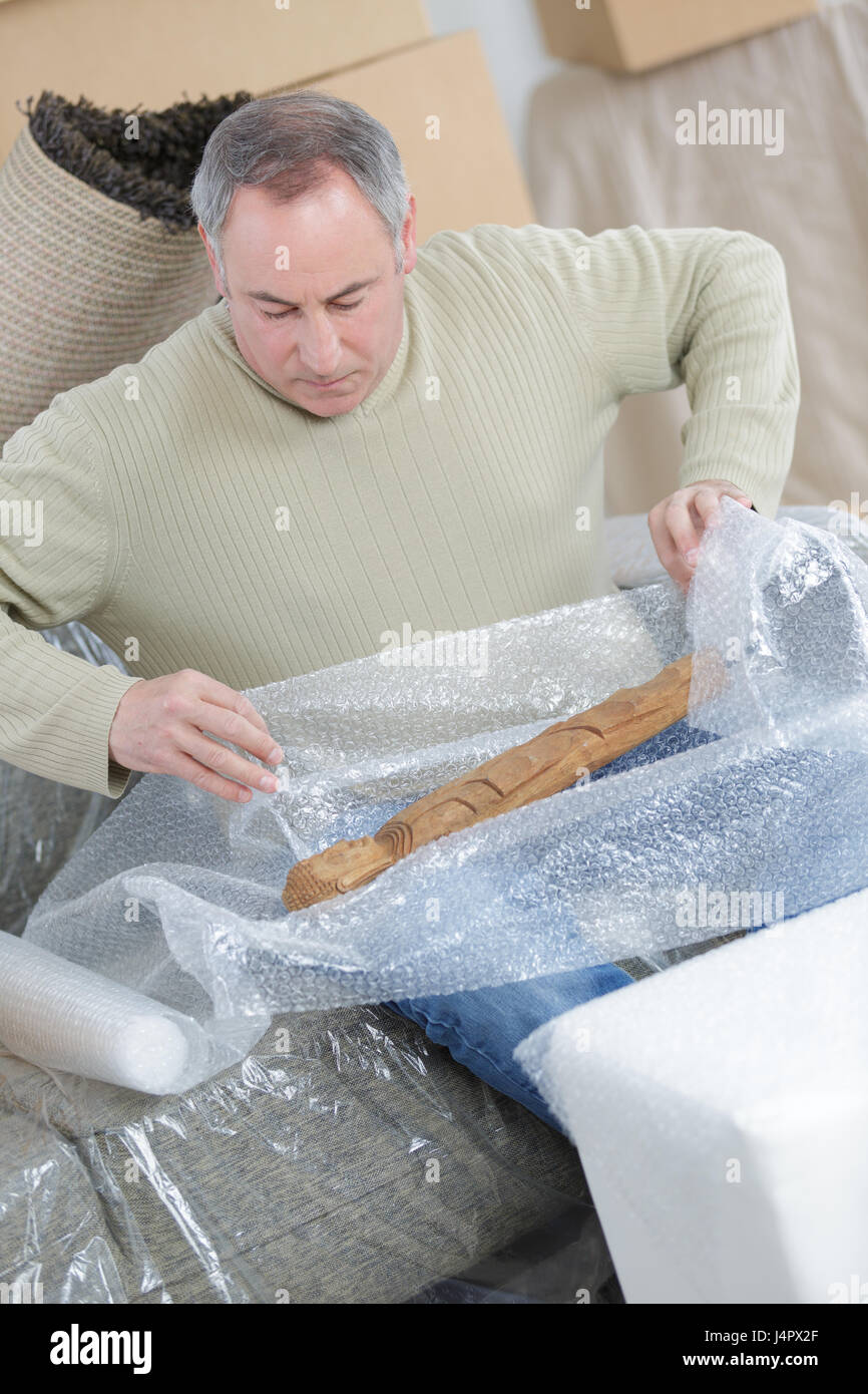 wrapping a statue Stock Photo - Alamy
