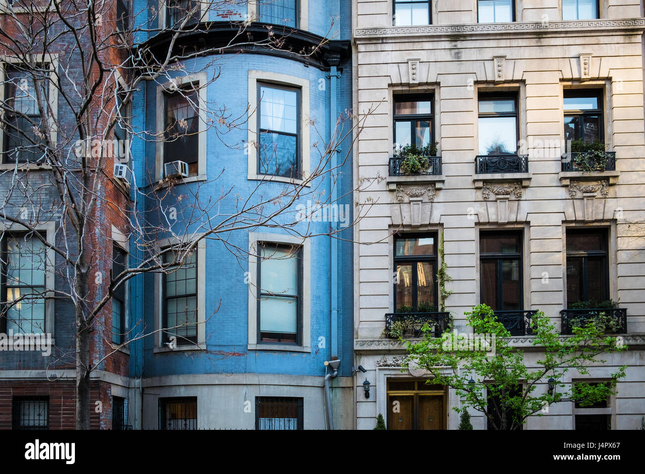 Old apartment buildings in New York City with blue paint Stock Photo ...