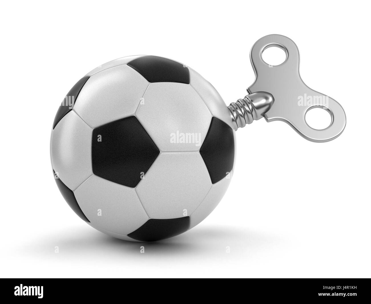 Soccer football with winding key. Image with clipping path Stock Photo ...