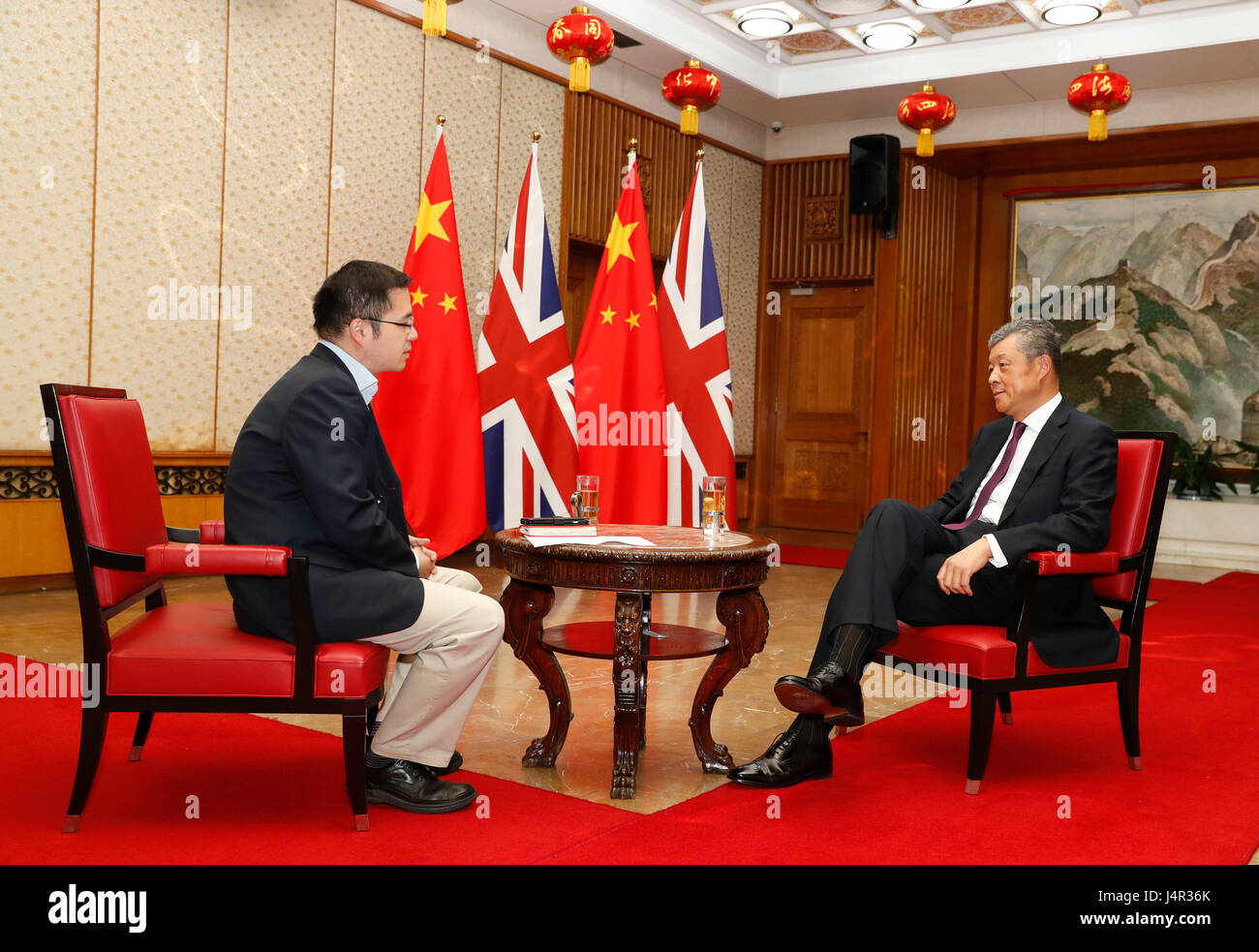 London, Britain. 12th May, 2017. Chinese Ambassador to Britain Liu Xiaoming (R) receives an ...