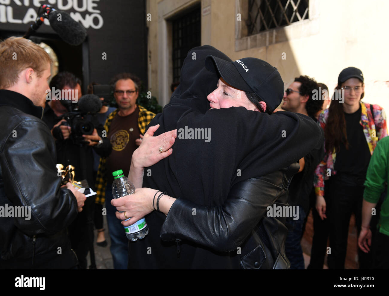 Venice, Italy. 13th May, 2017. Artist Anne Imhof (c), winner of the ...