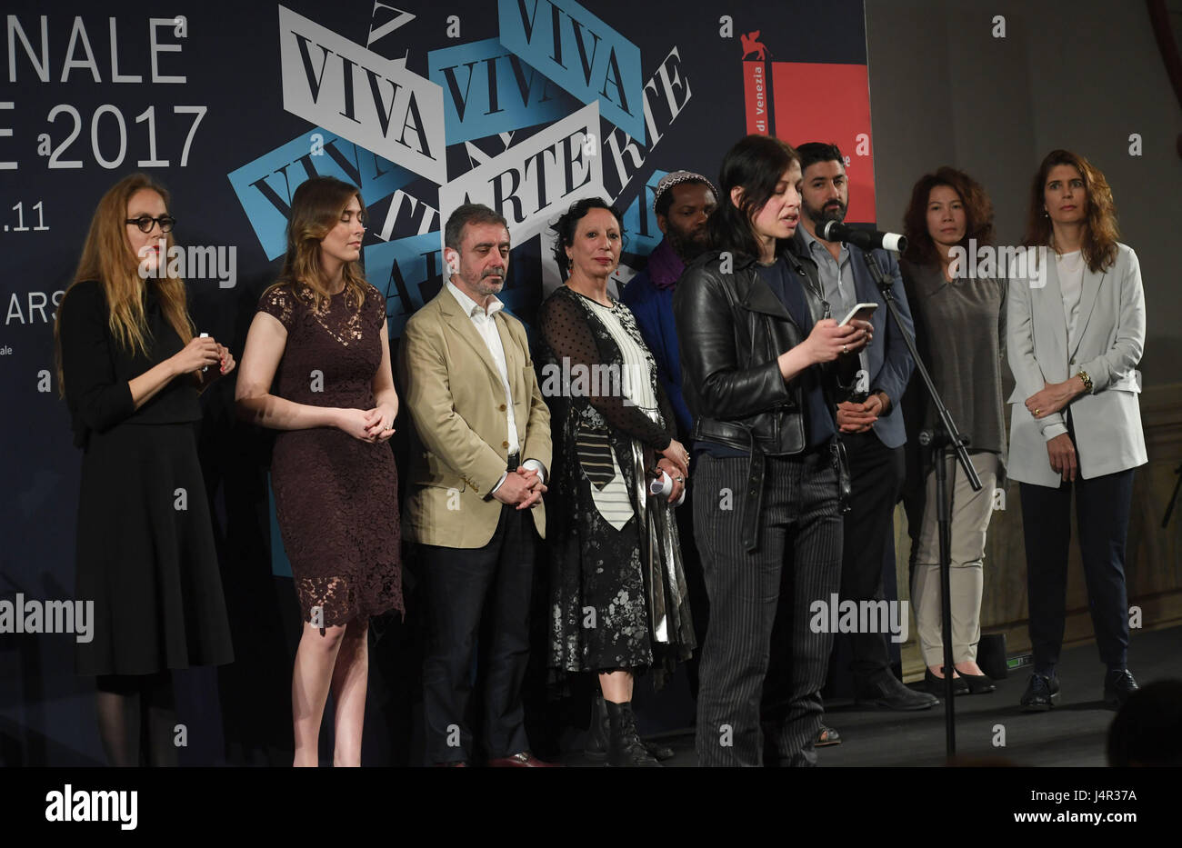 Venice, Italy. 13th May, 2017. Artist Anne Imhof (c), winner of the ...
